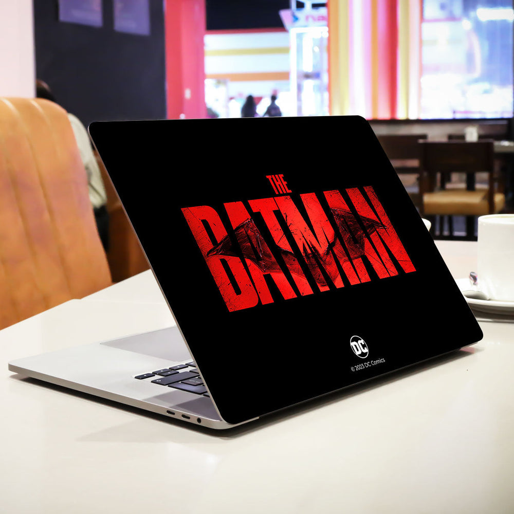 Gotham's Guardian: The Batman in Bold Red DC Laptop Skin for Superhero ...