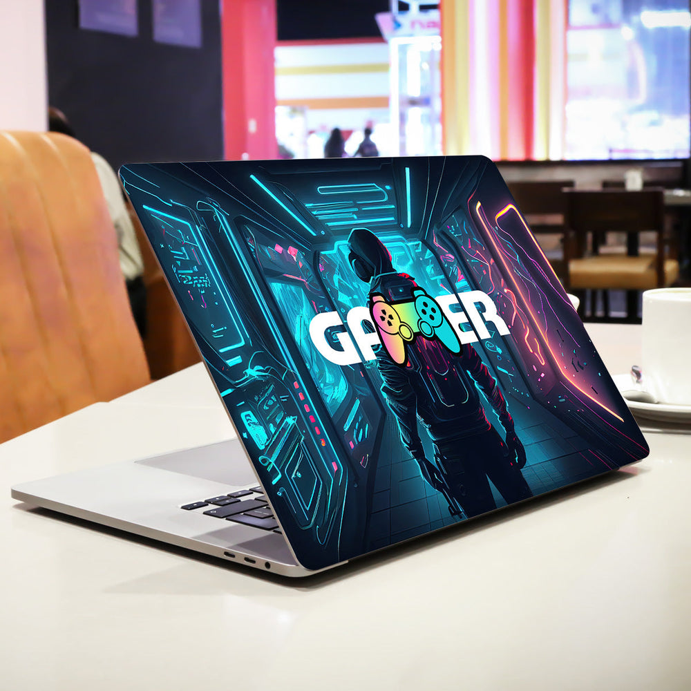 Show Your Gaming Pride with Gamer in Glowing Background Laptop Skin ...